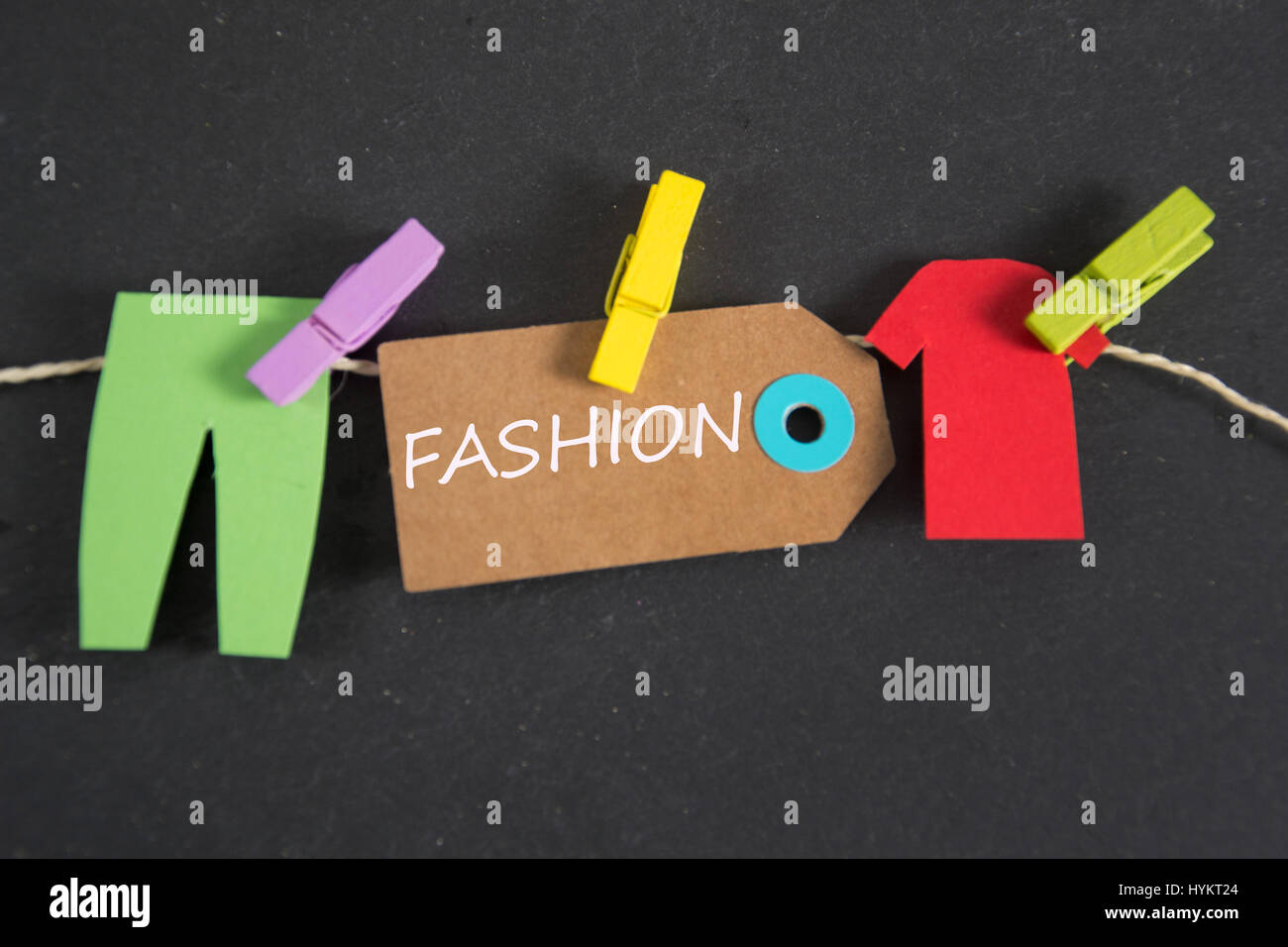 Fasion inscription written on paper tag Stock Photo - Alamy