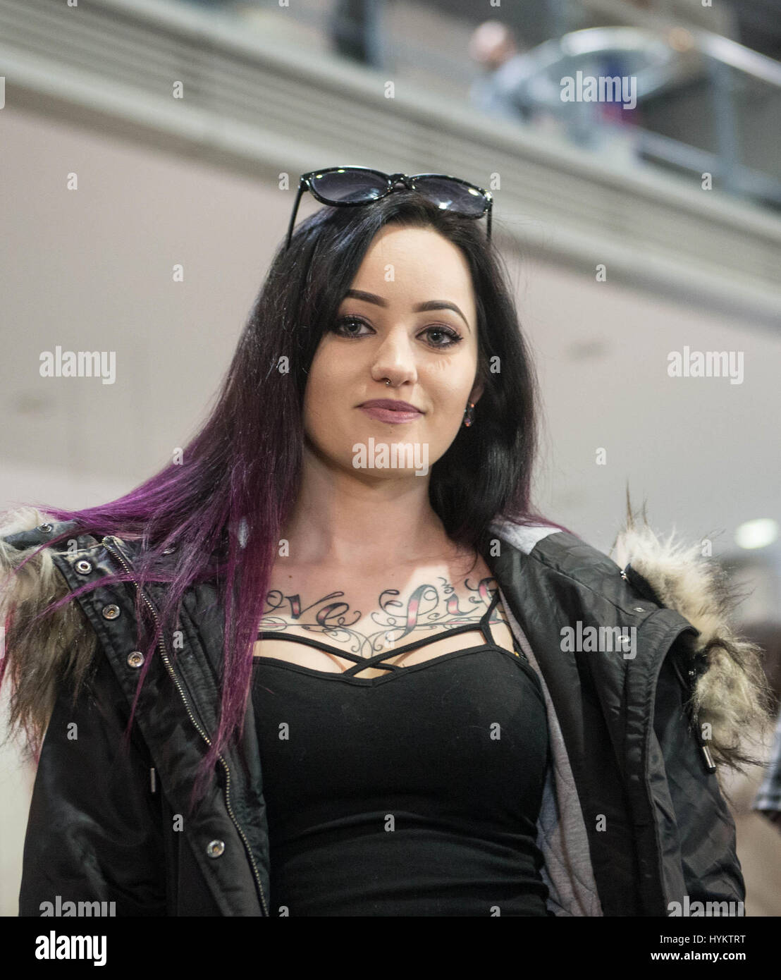Poznan, Poland: Visitors at the tattoo convention show off their ...