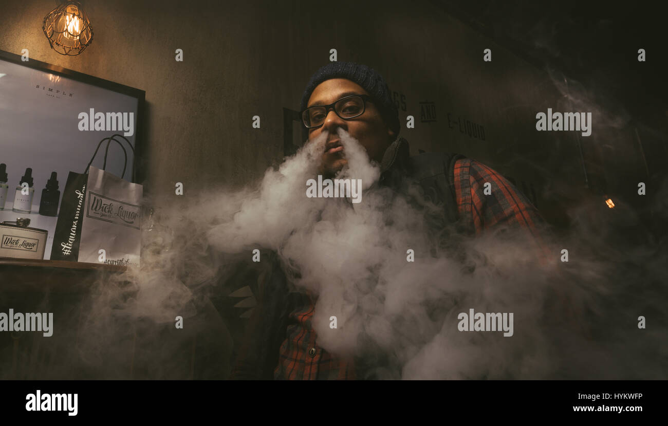 LONDON, UK: A male vaper relaxed. LIFTING the lid on UK underground ...