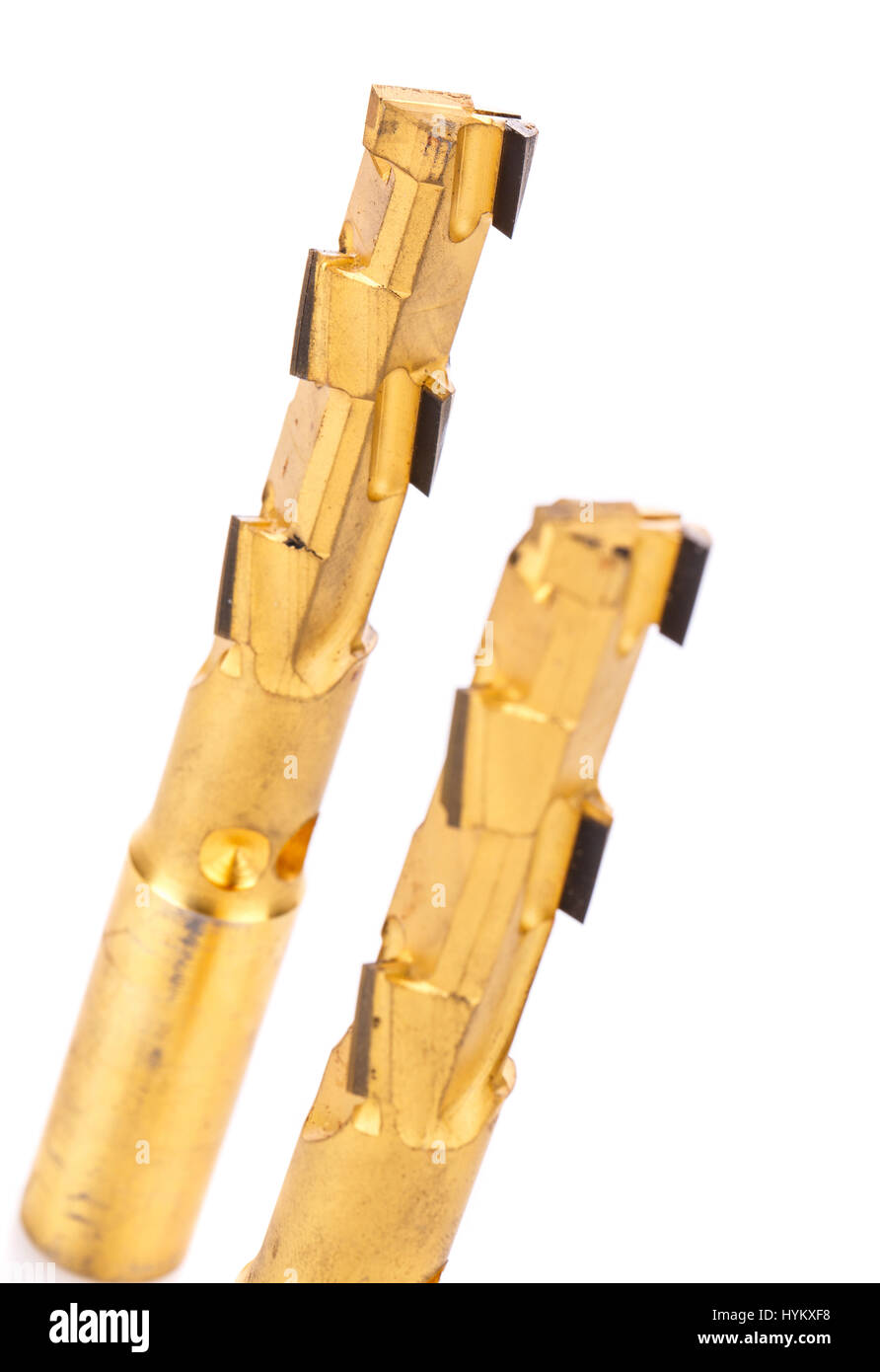 Golden tips head for drill on white background Stock Photo - Alamy