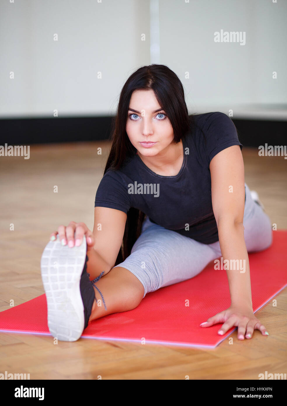 Women doing stretching in fitness club Stock Photo - Alamy