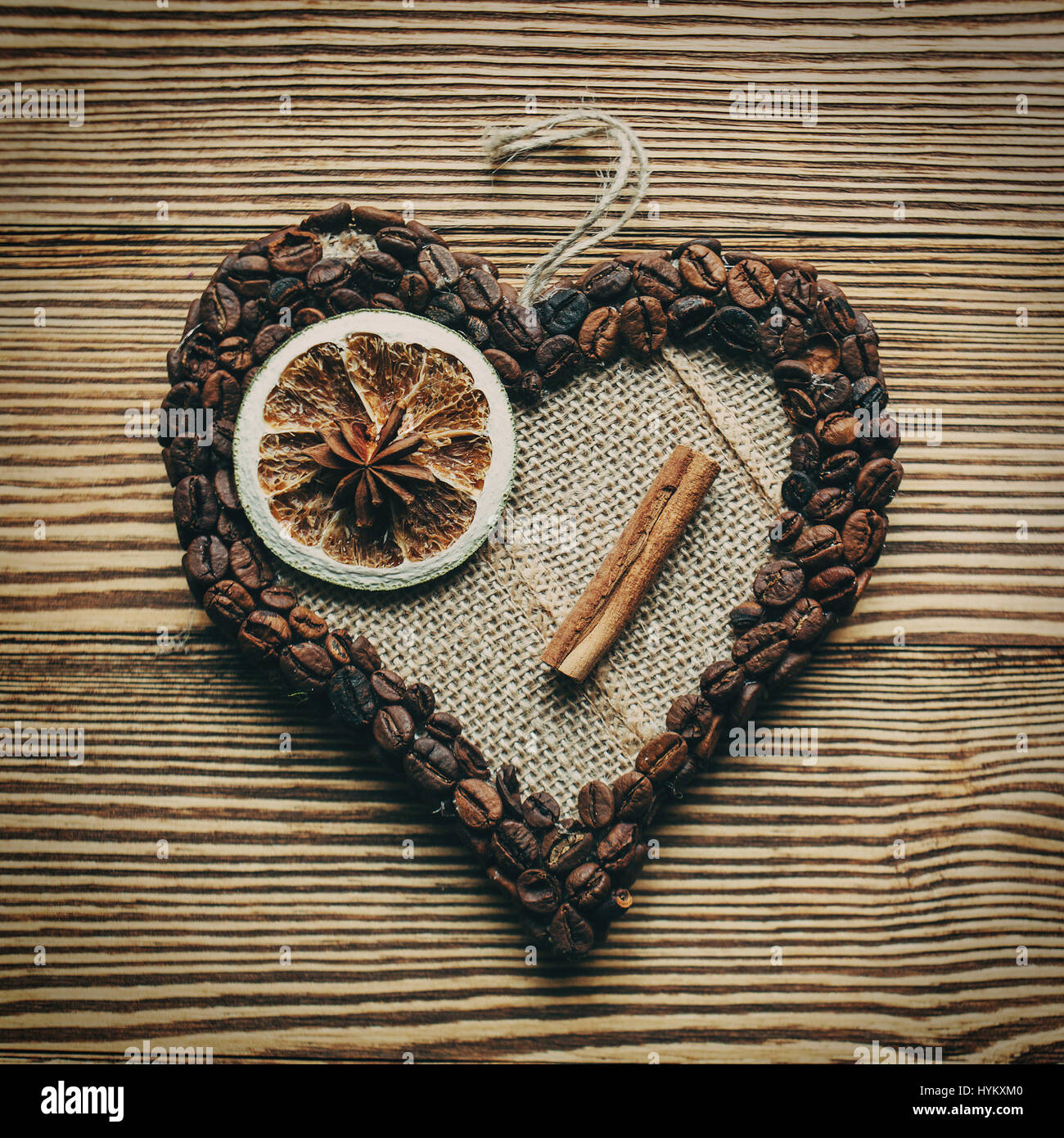 decorated heart on a wooden background Stock Photo - Alamy