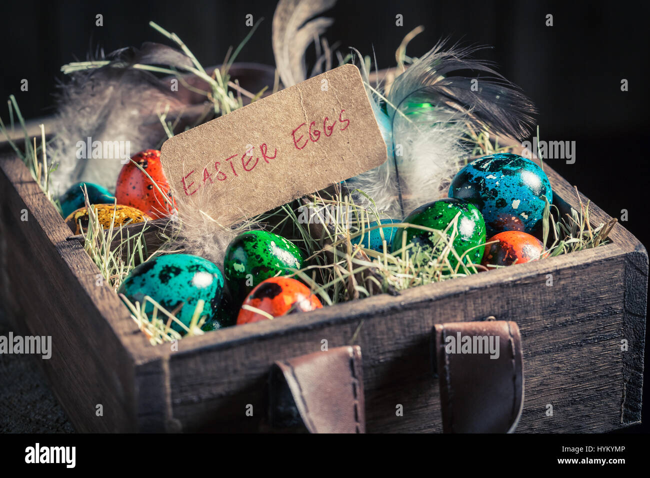Farm eggs for Easter with hay and feathers Stock Photo - Alamy