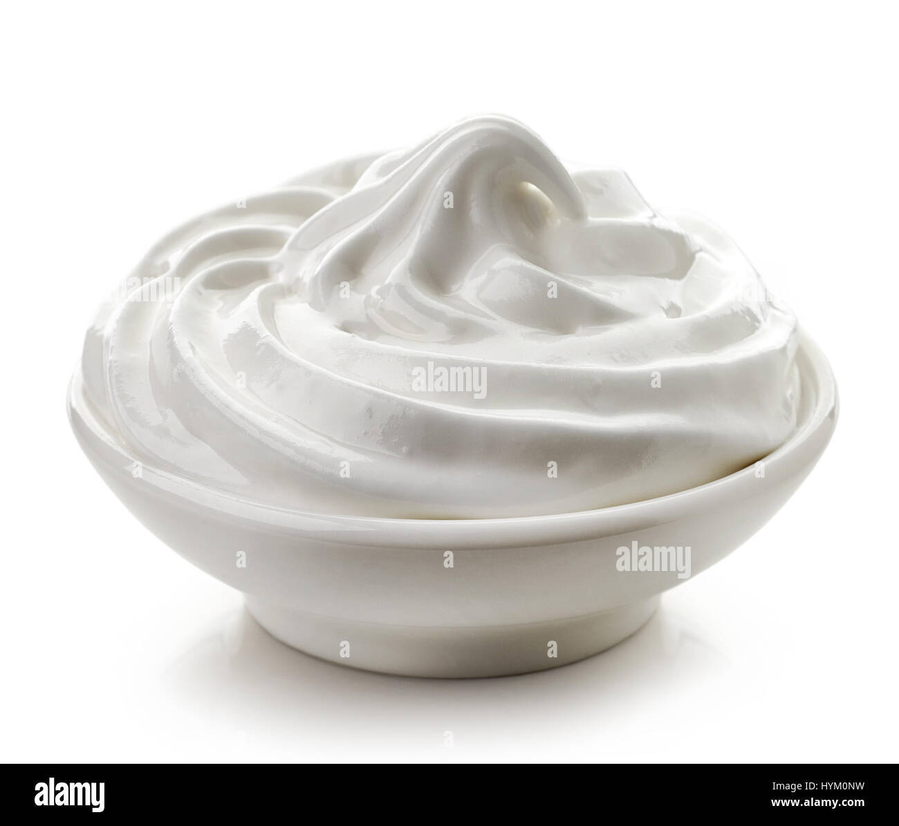 bowl of whipped egg whites isolated on white background Stock Photo - Alamy