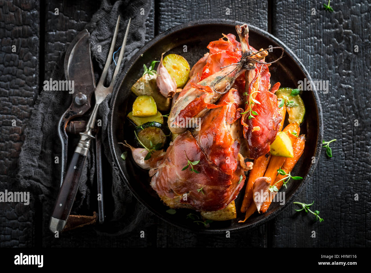 Fresh pheasant with bacon and spices and vegetables Stock Photo - Alamy