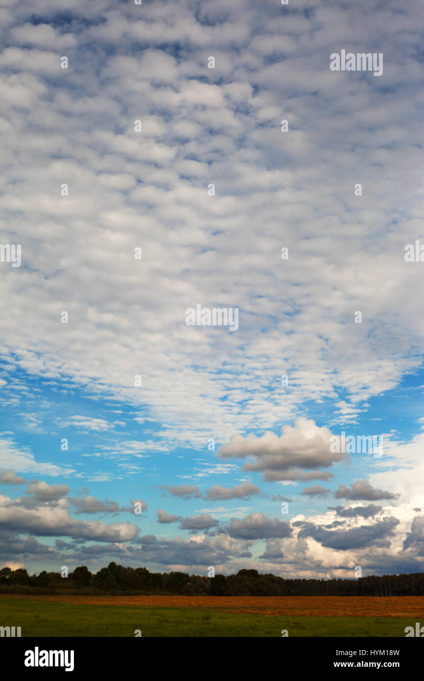 Clouds over land Stock Photo - Alamy