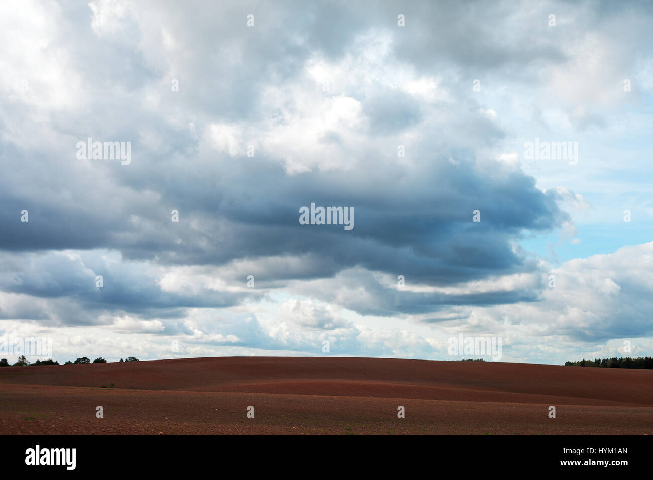 Cloud over land and fields Stock Photo - Alamy