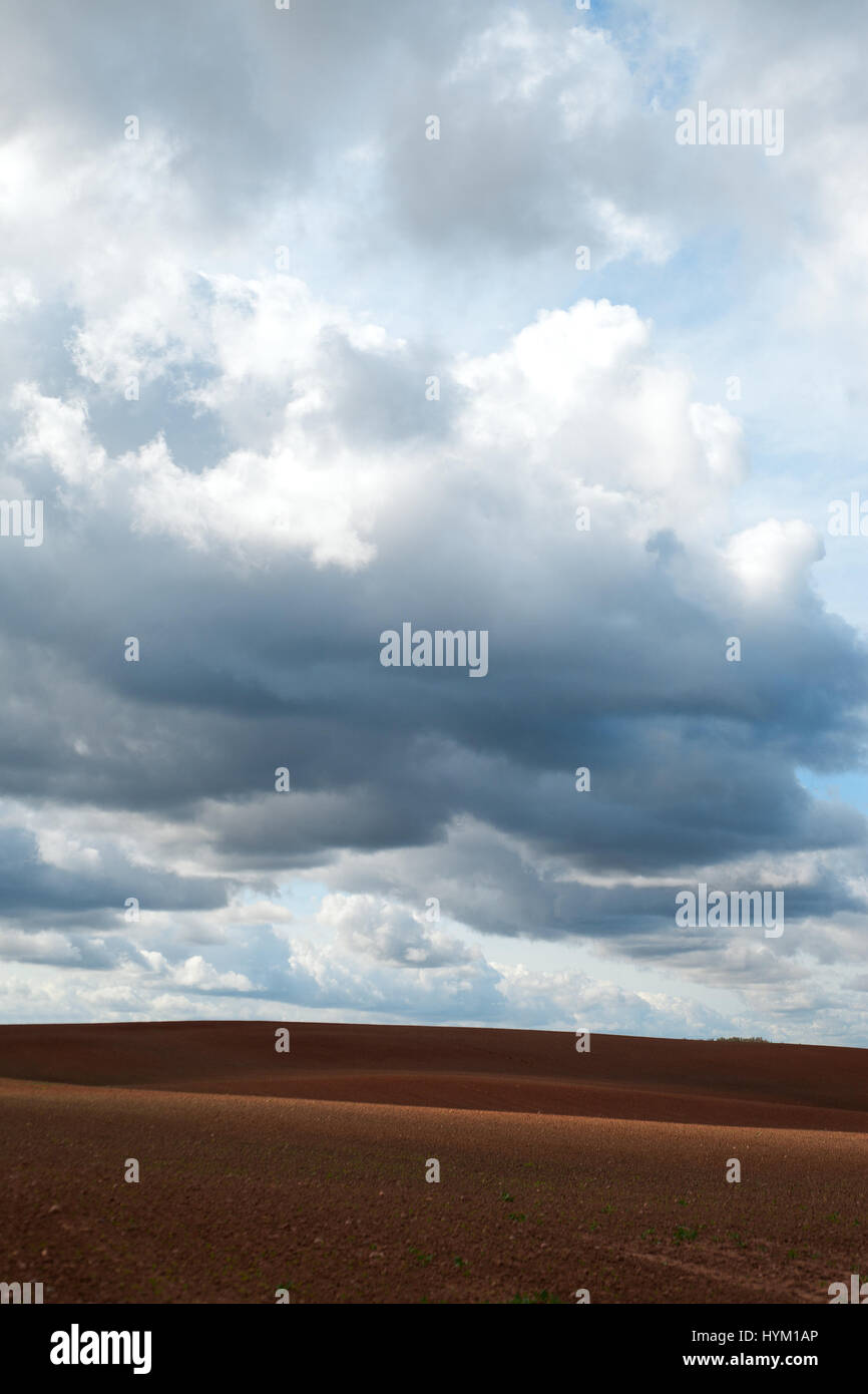 Cloud over land and fields Stock Photo - Alamy
