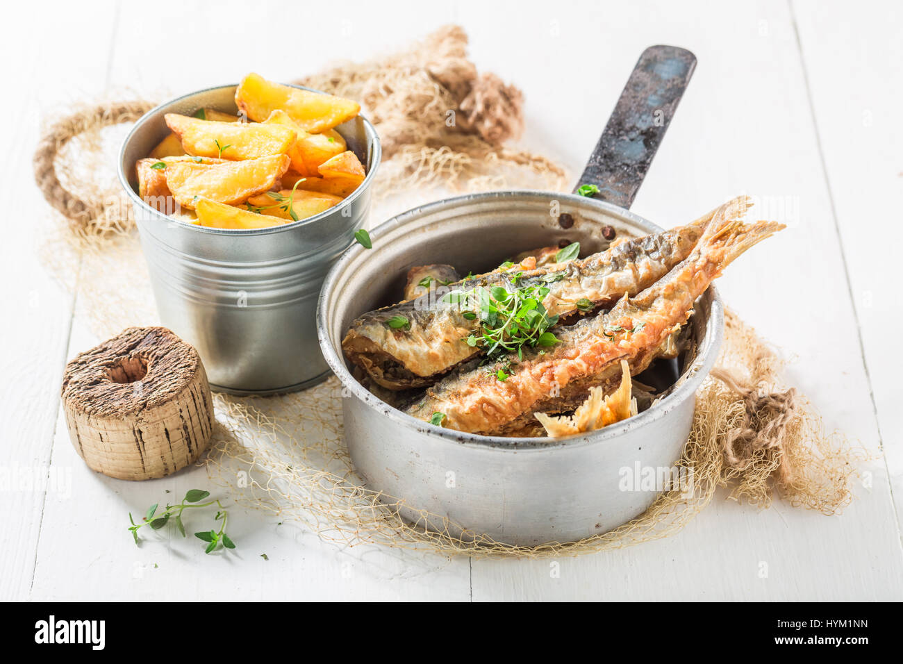 Homemade roasted herring fish with salt and herbs Stock Photo - Alamy