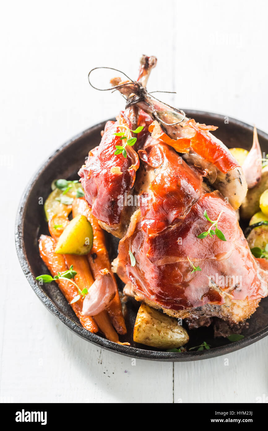 Homemade pheasant with bacon and vegetables and spices Stock Photo - Alamy