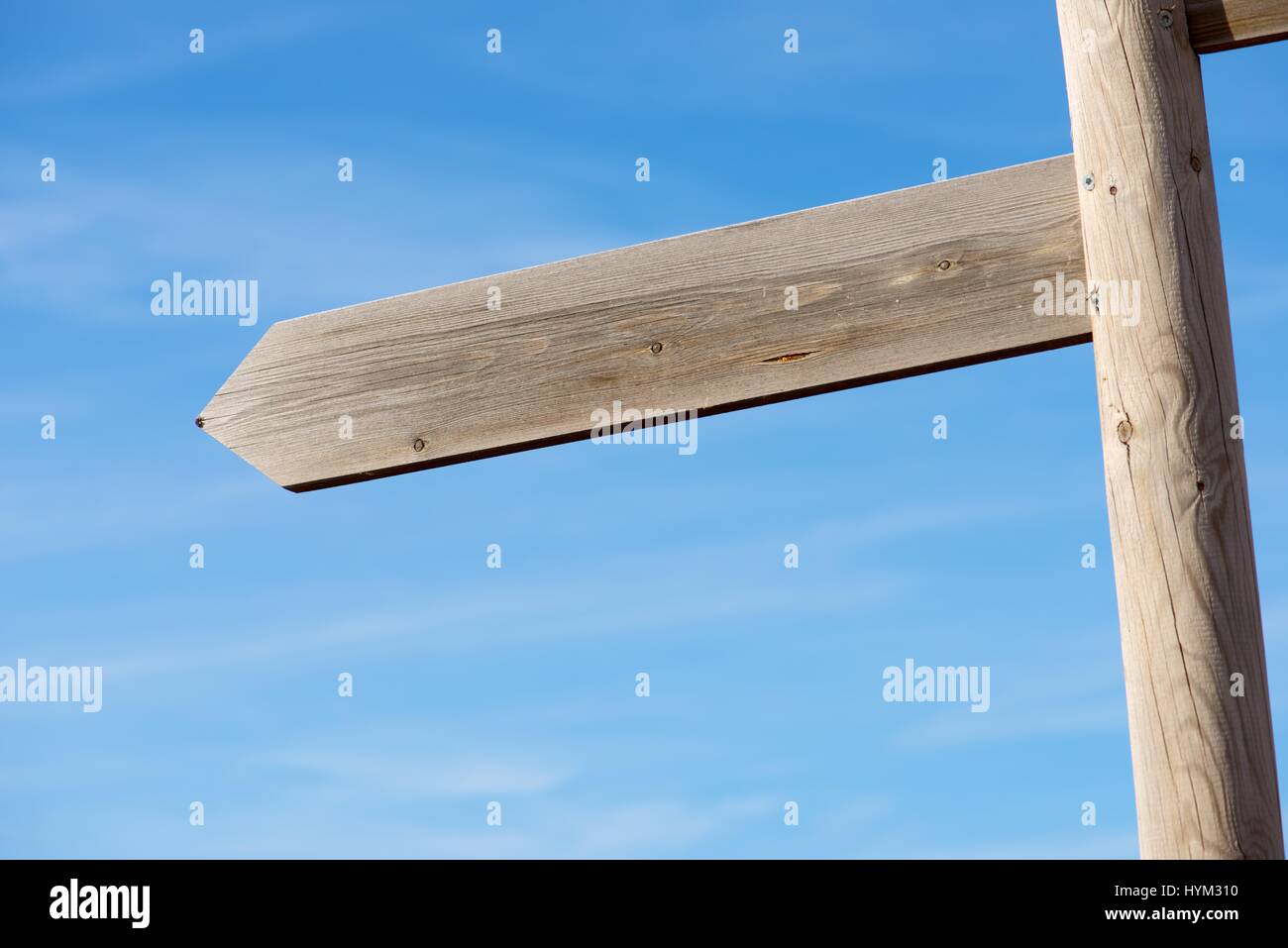 View of two directional wood signals Stock Photo - Alamy