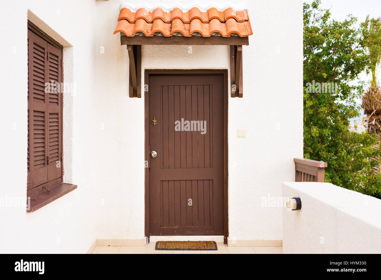 Wooden front door of a home. Front view Stock Photo - Alamy