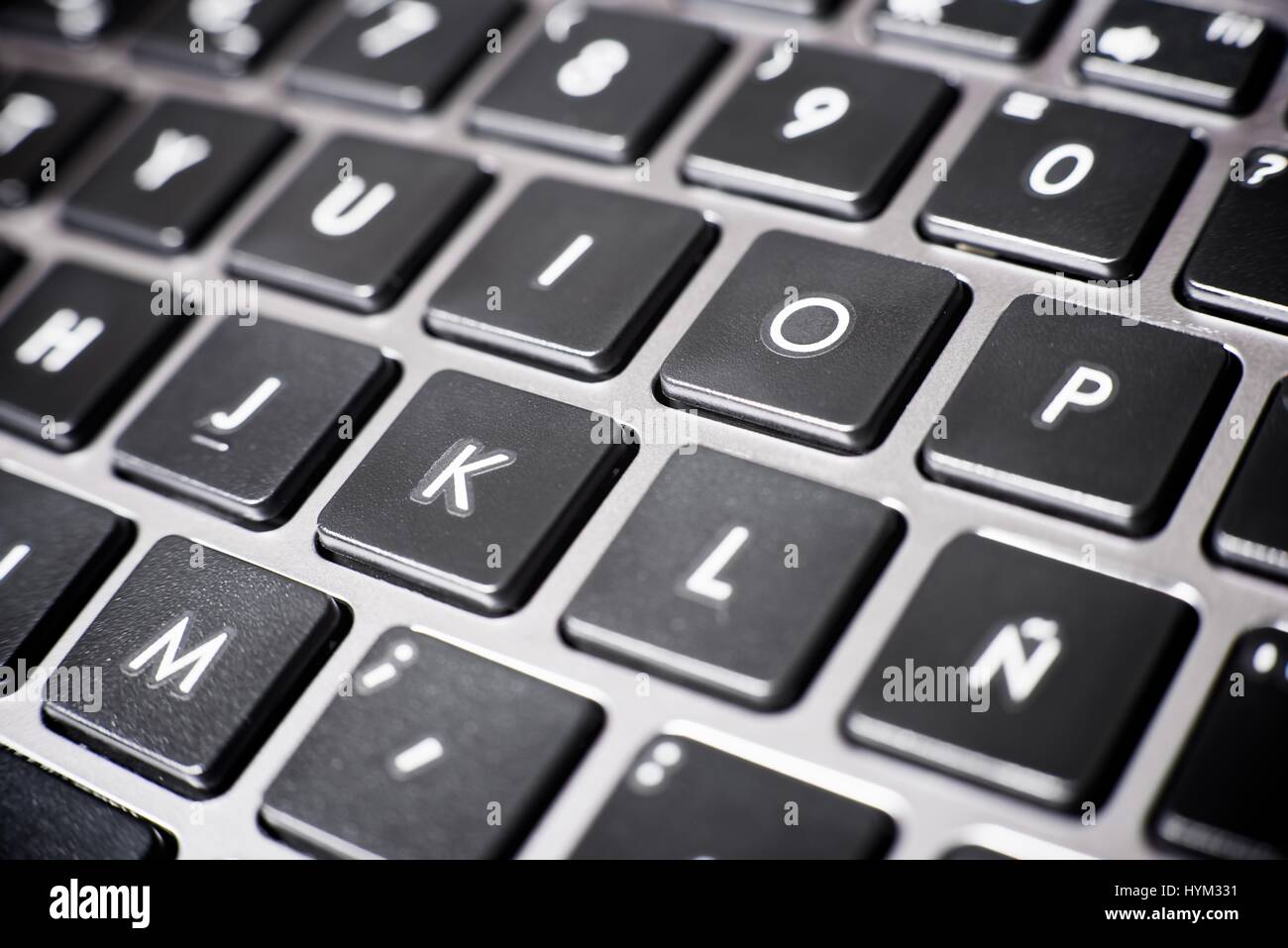 Forefront of a gray laptop keyboard Stock Photo - Alamy