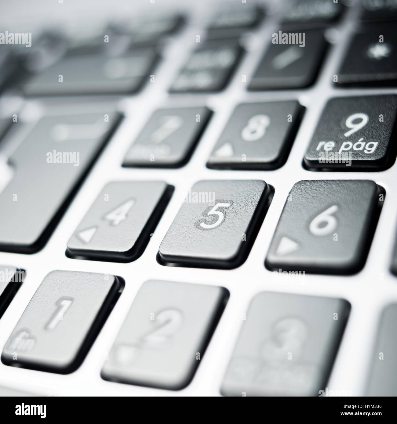 Forefront of a gray laptop keyboard Stock Photo - Alamy