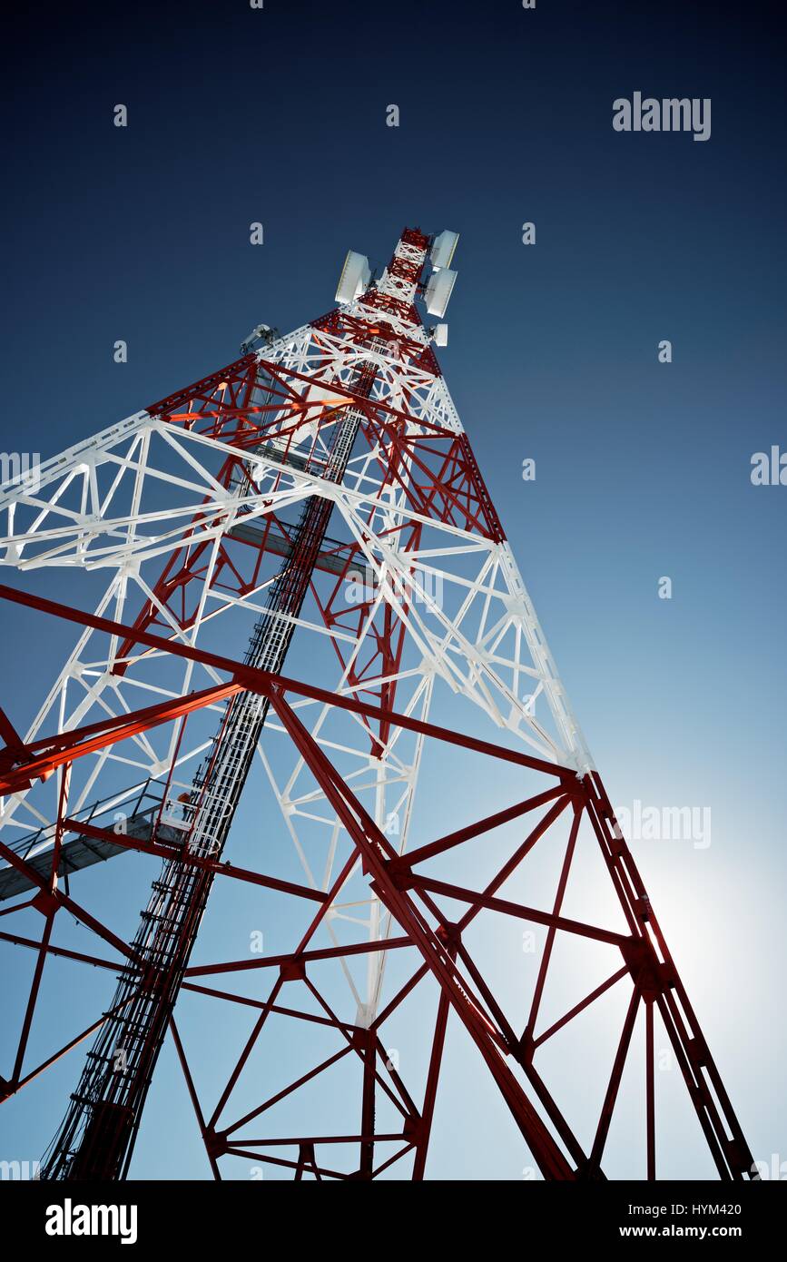 Telecommunications tower with clear blue sky Stock Photo - Alamy