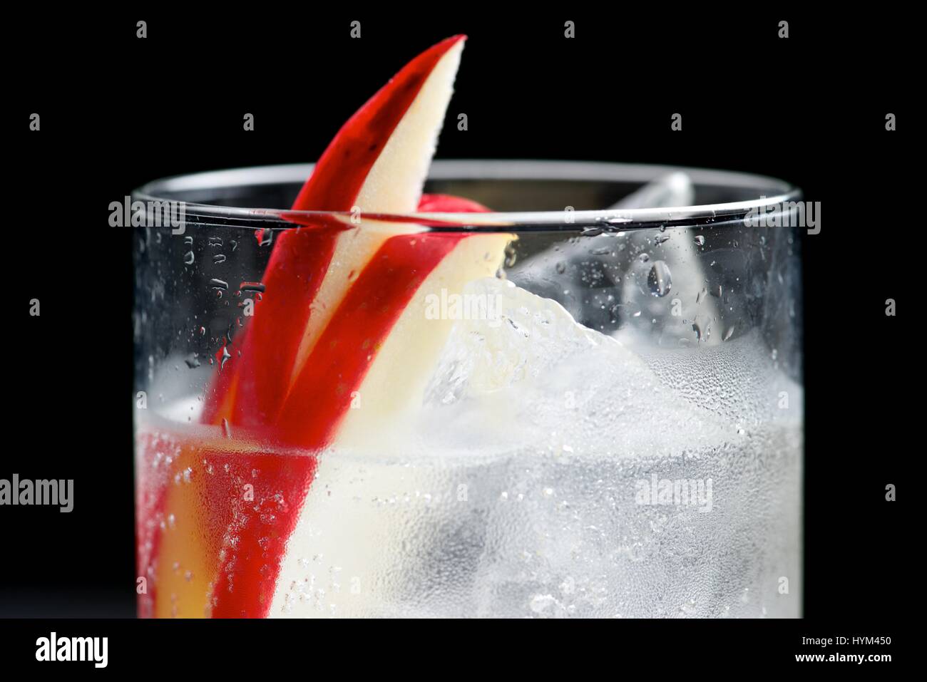 Apple gin tonic served in glass Stock Photo - Alamy