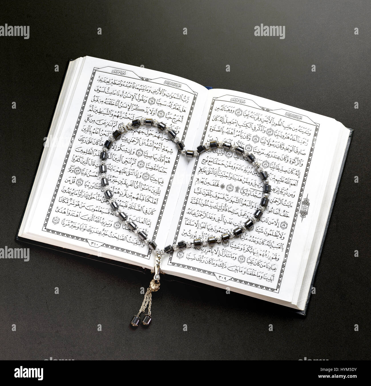 Holy Book of Quran With Heart Shaped Rosary, Love Concept Stock Photo ...