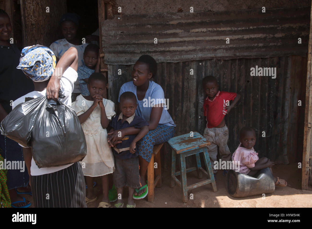 People sitting in the street in Kibera slums, Nairobi, Kenya, East ...