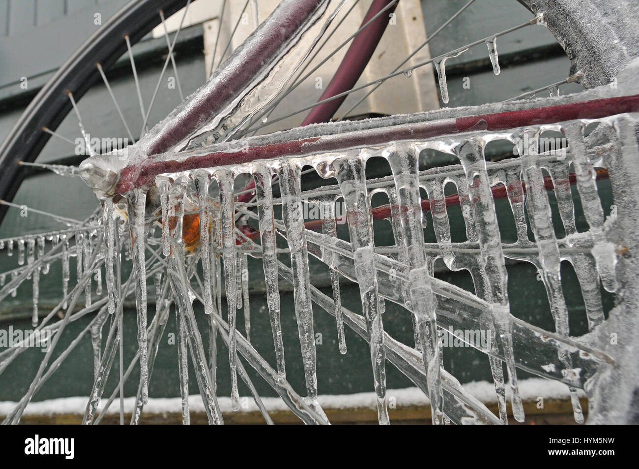 Lots of icicles on a frozen red bike Stock Photo - Alamy