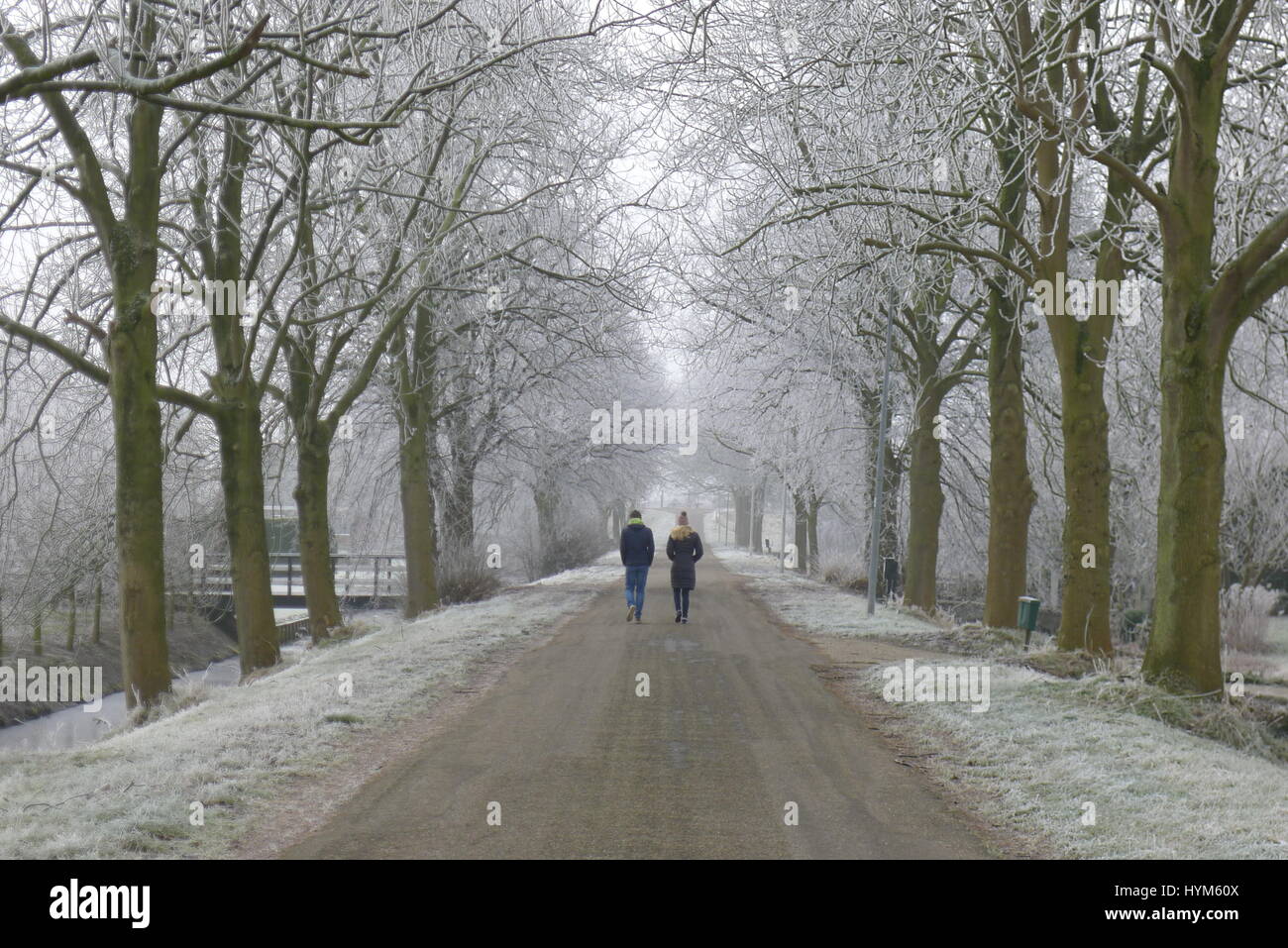 Couple snow forrest hi-res stock photography and images - Alamy