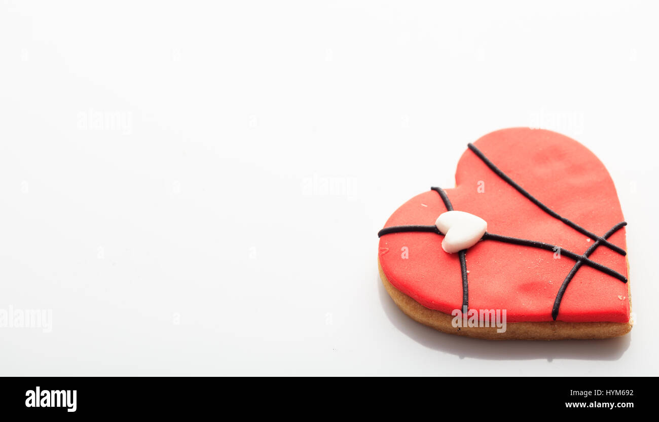 Heart shaped biscuit isolated on white background Stock Photo - Alamy