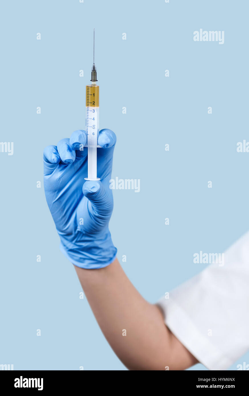 Hand with syringe close-up Stock Photo - Alamy