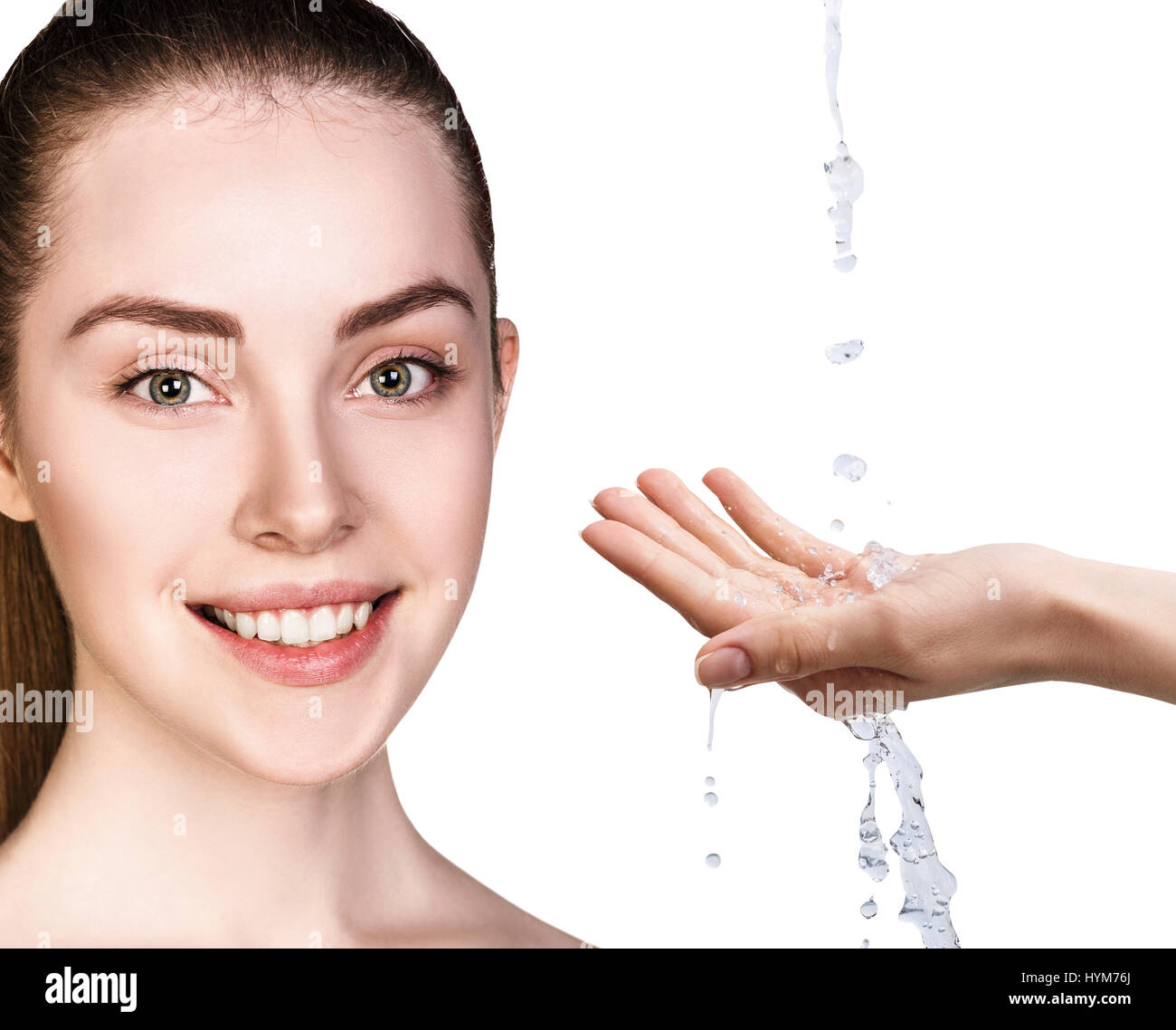 Woman face and pouring water in hand Stock Photo - Alamy
