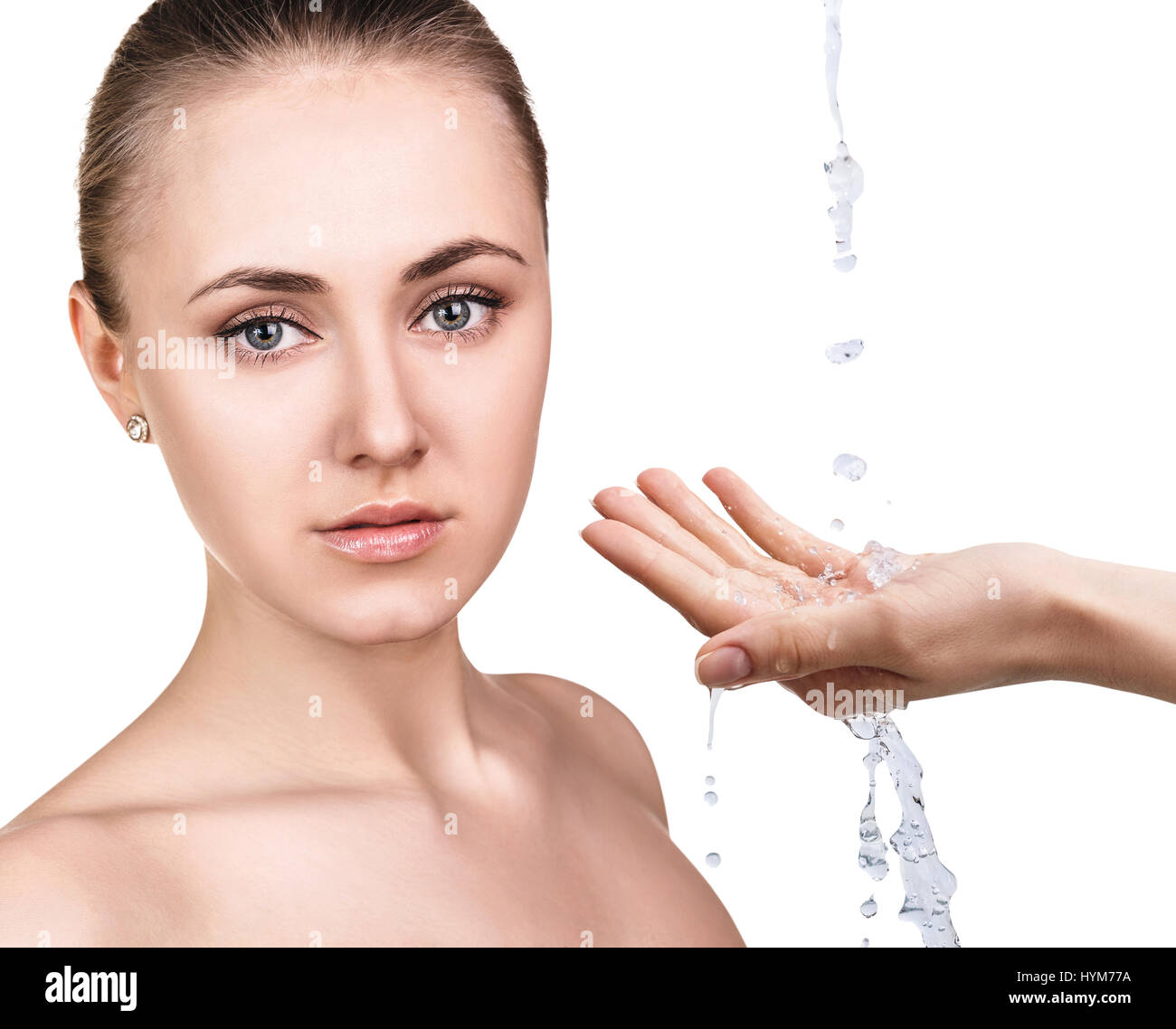 Woman face and pouring water in hand Stock Photo - Alamy