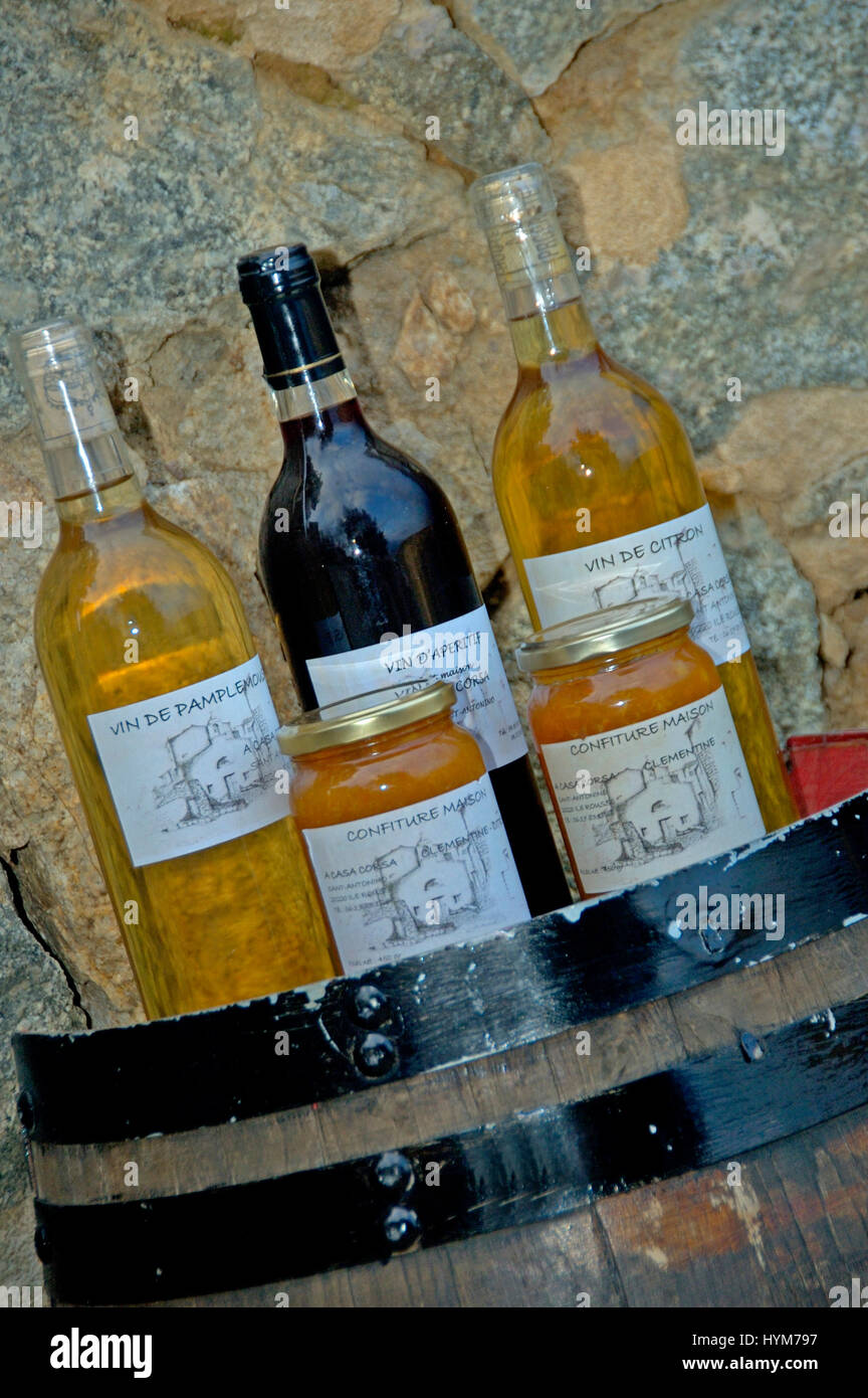 Bottles of wine and jars of jam on display Stock Photo - Alamy