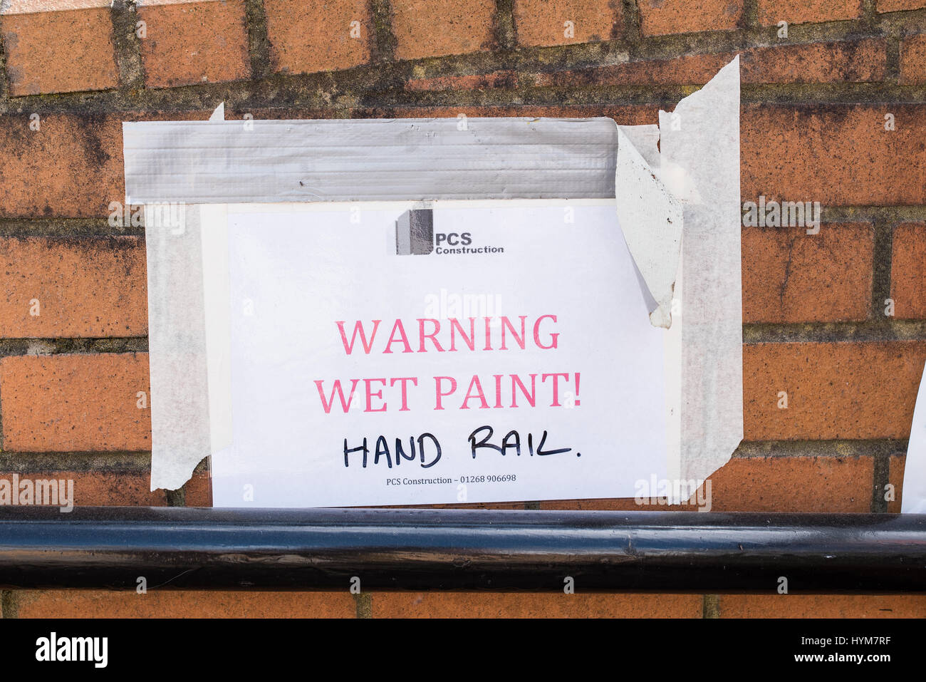 Wet paint sign Stock Photo - Alamy