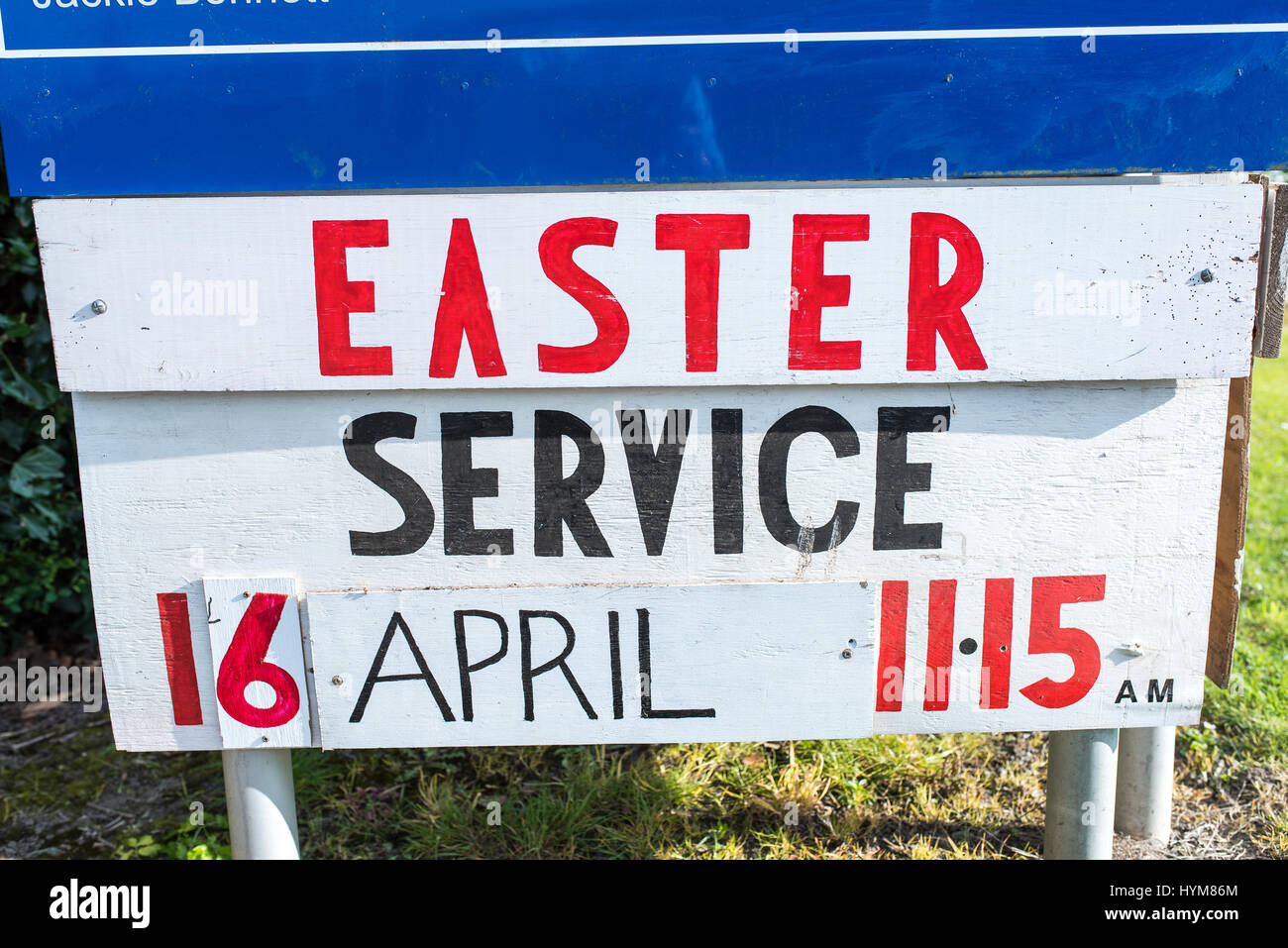 Easter church service sign Stock Photo - Alamy