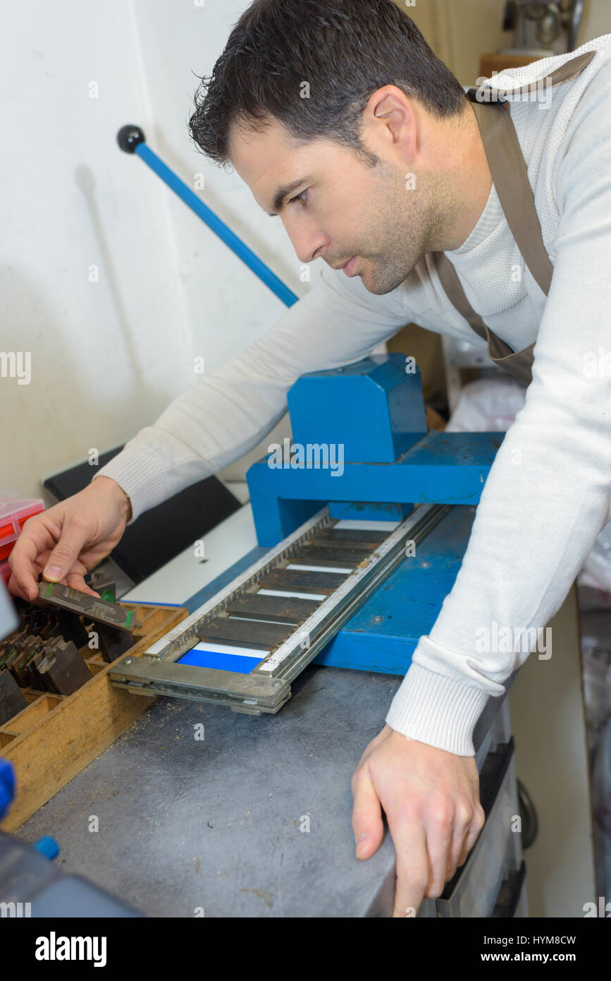 worker inspecting the object Stock Photo - Alamy