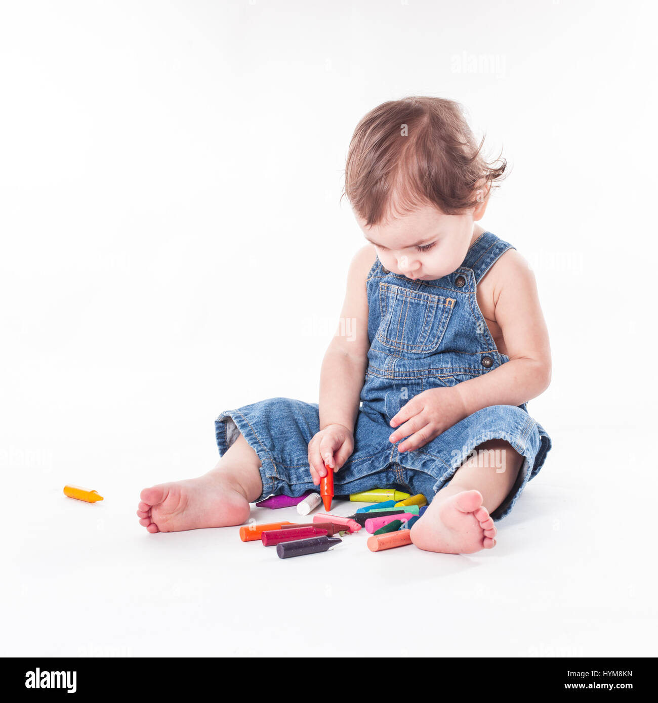 Baby girl is writting Stock Photo - Alamy