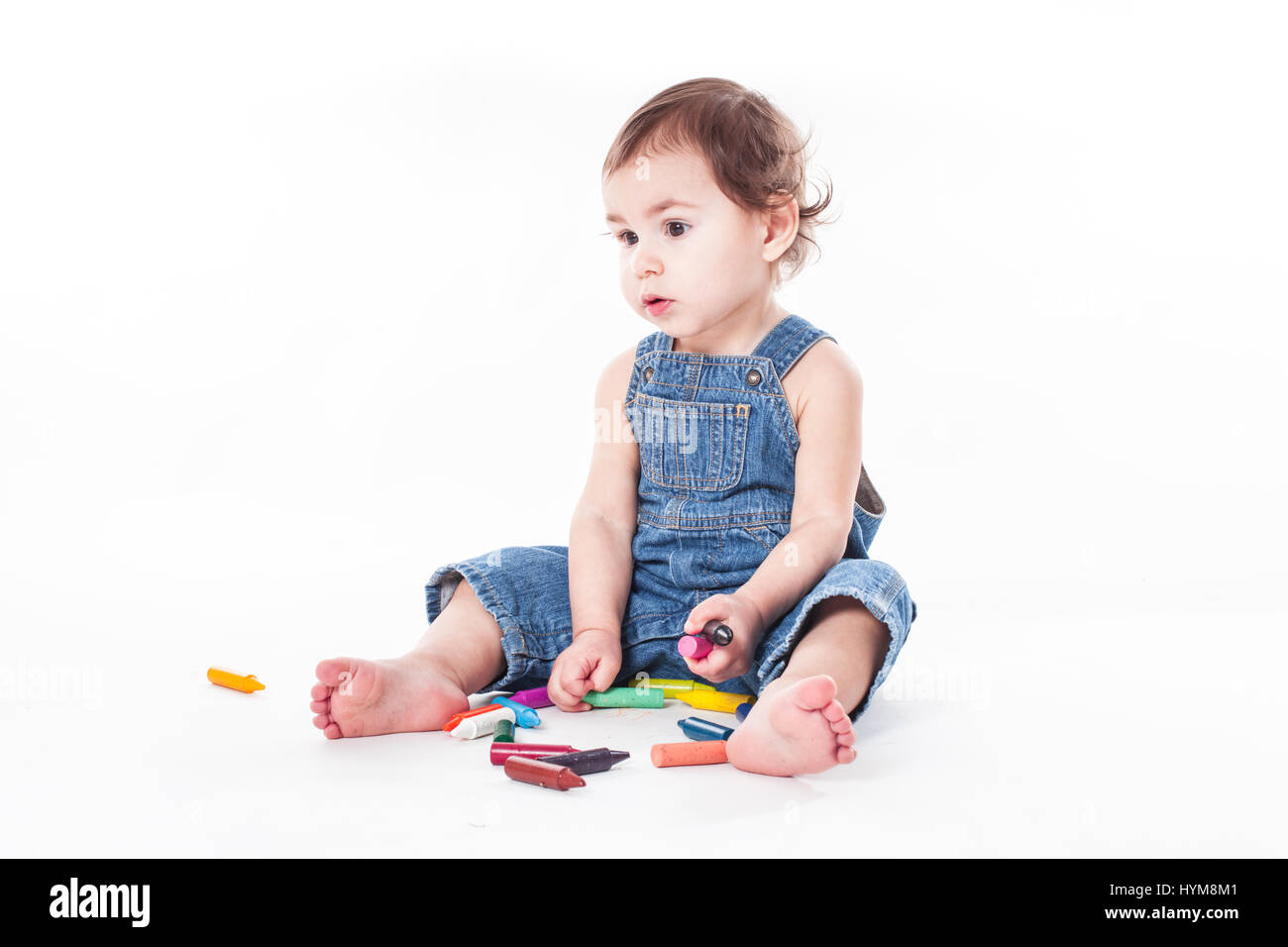 Baby girl is writting Stock Photo - Alamy