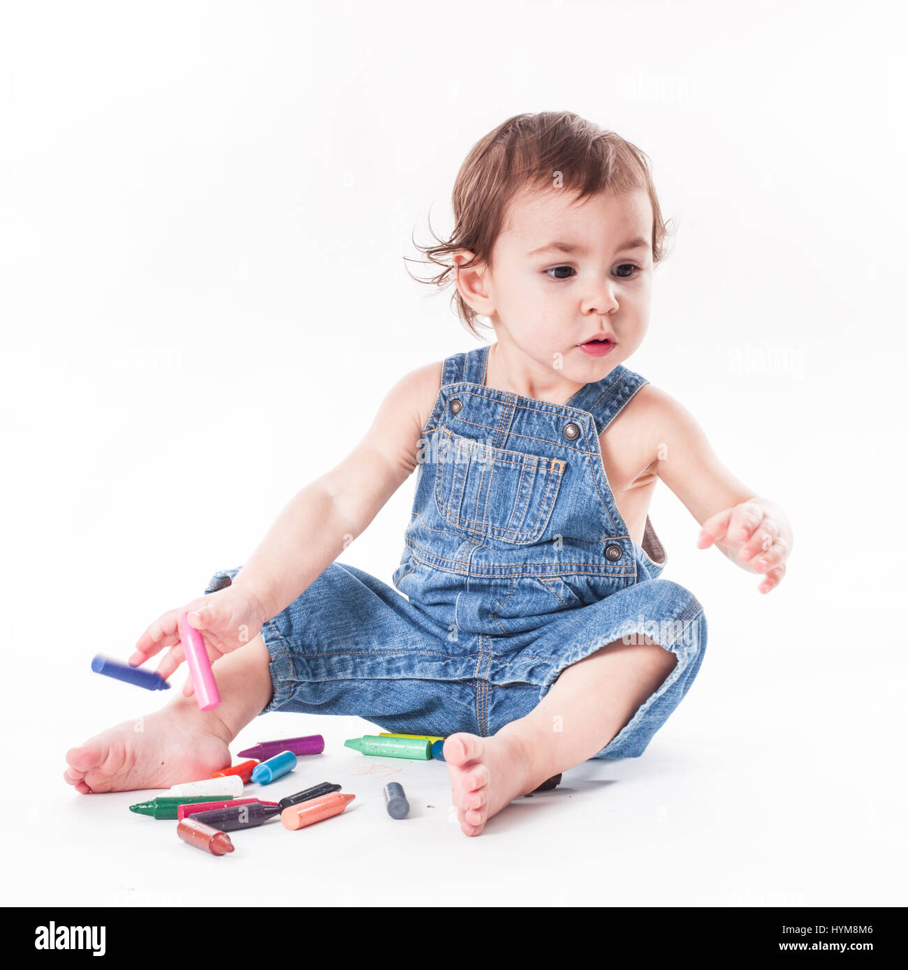 Baby girl is writting Stock Photo - Alamy