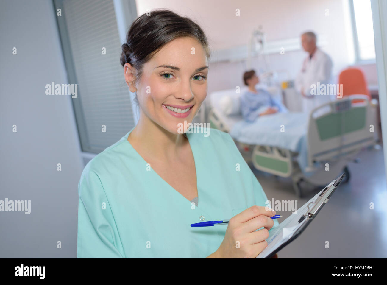 taking notes for the patient Stock Photo - Alamy