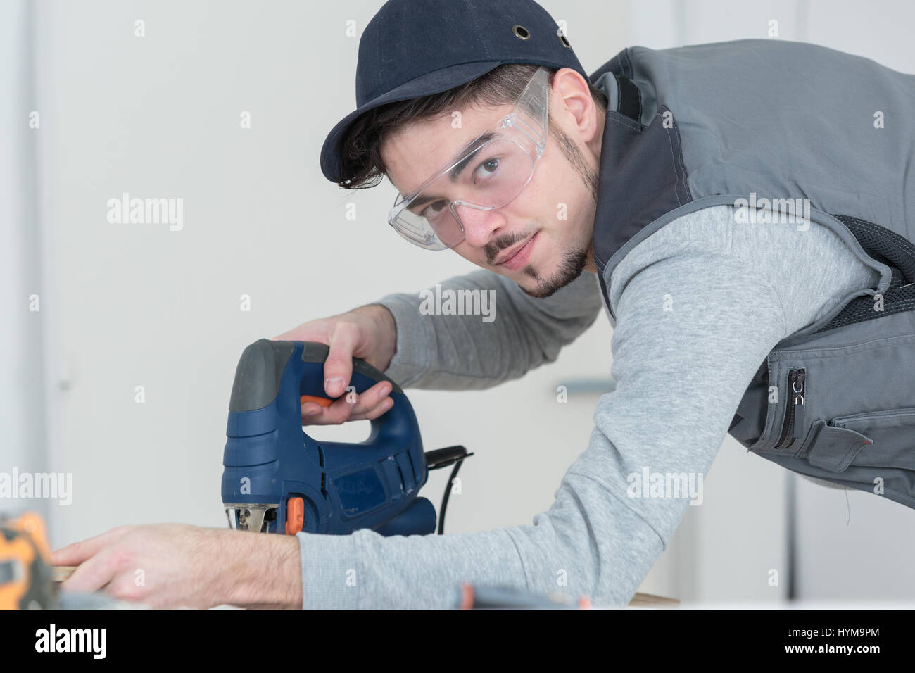worker posing while working Stock Photo - Alamy