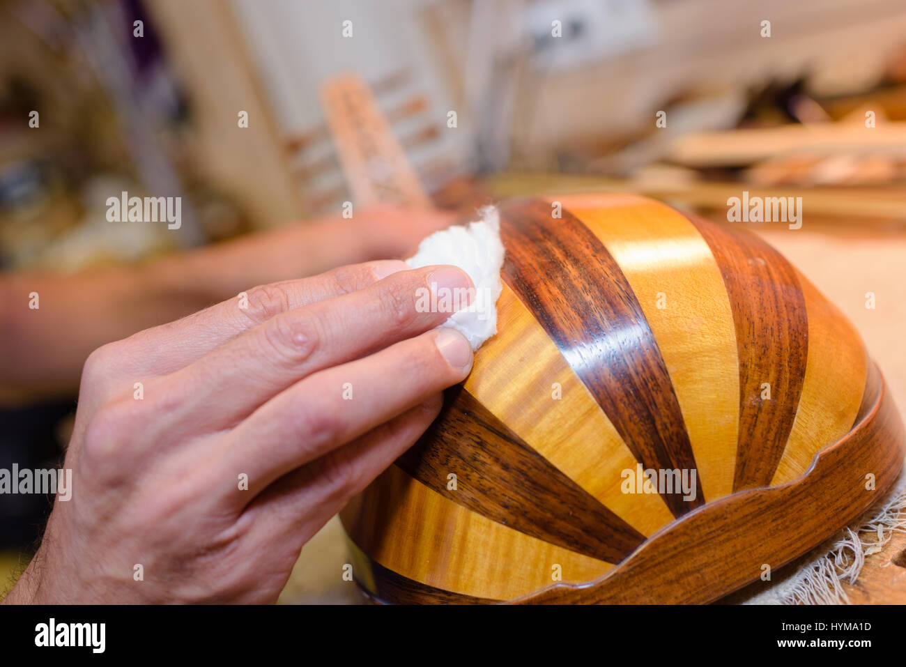 Hands polishing musical instrument Stock Photo - Alamy