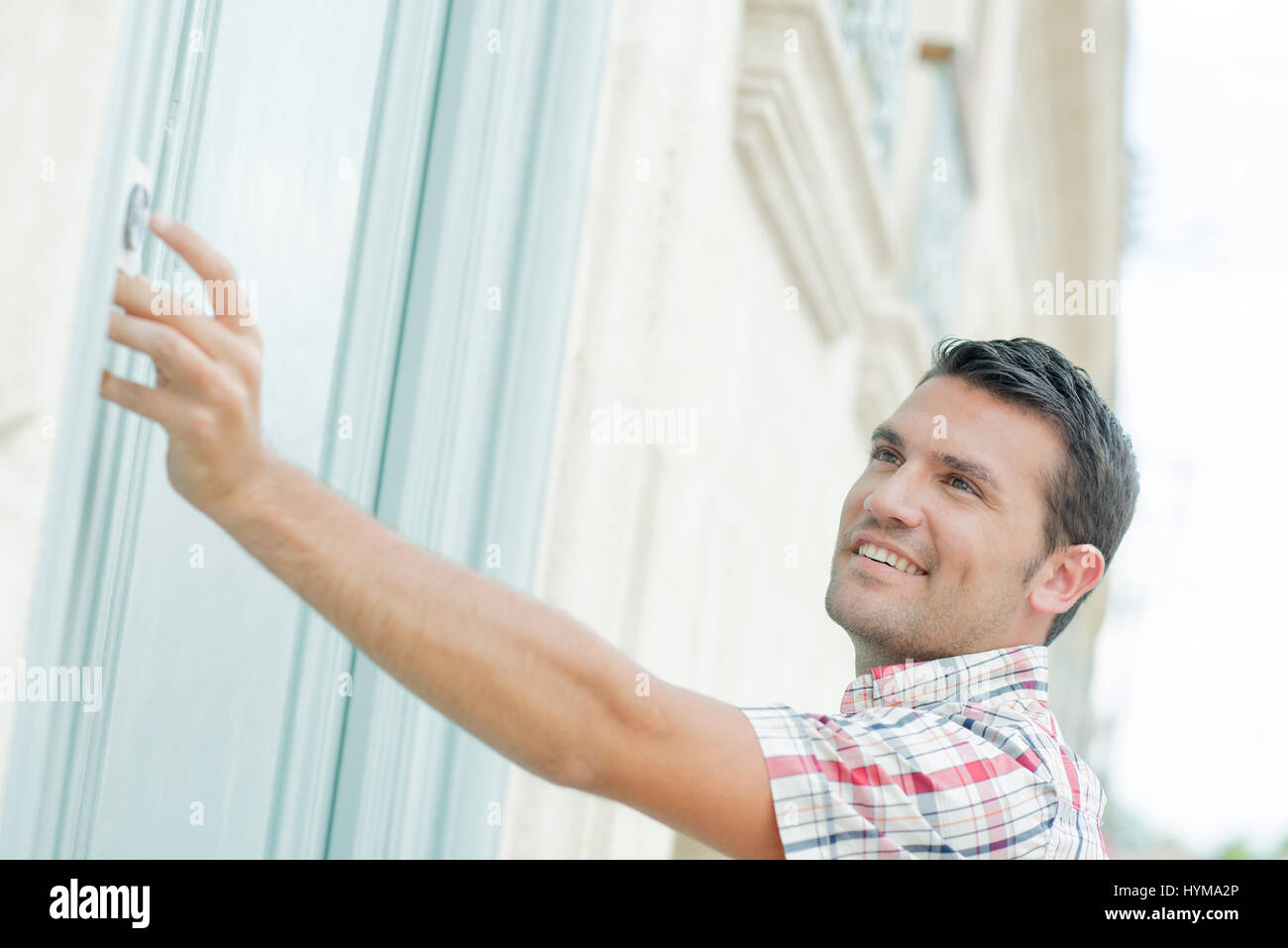 Man ringing at a door Stock Photo - Alamy