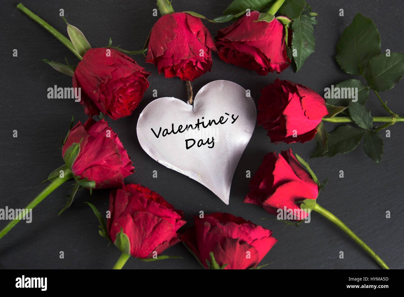 nice background with roses and a white heart Stock Photo - Alamy