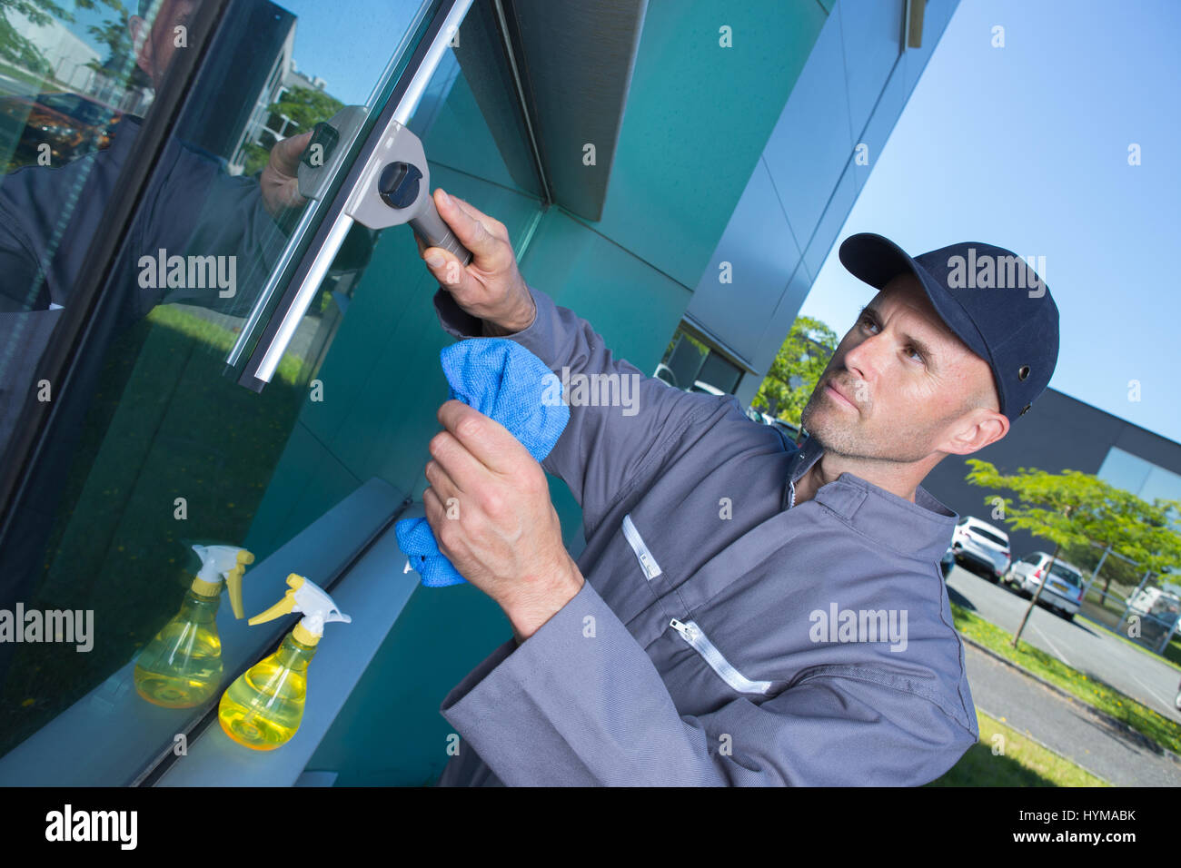 Man cleaning windows Stock Photo - Alamy