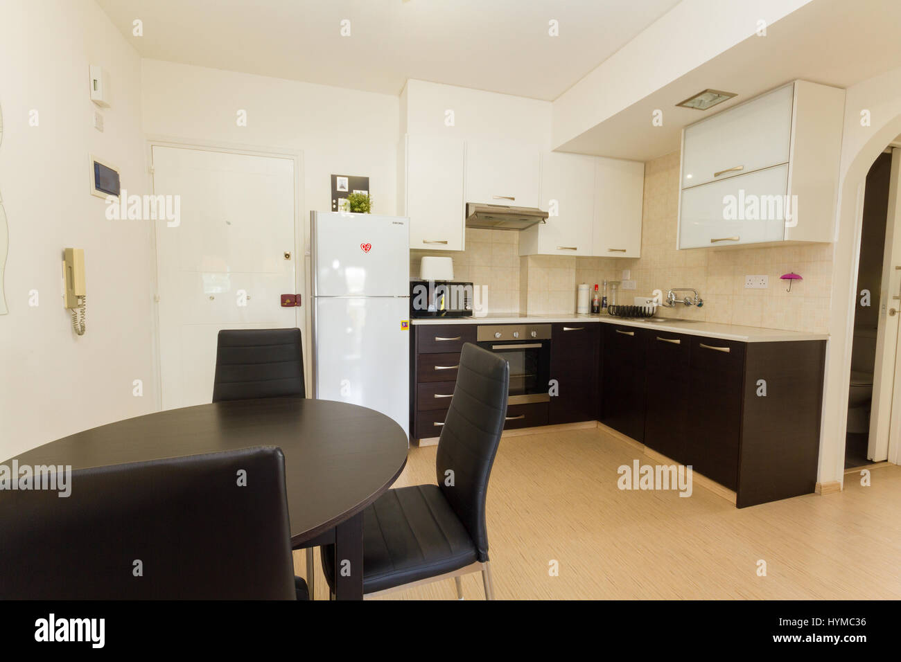 Modern Kitchen in Wenge and White colors containing table, chair, home ...