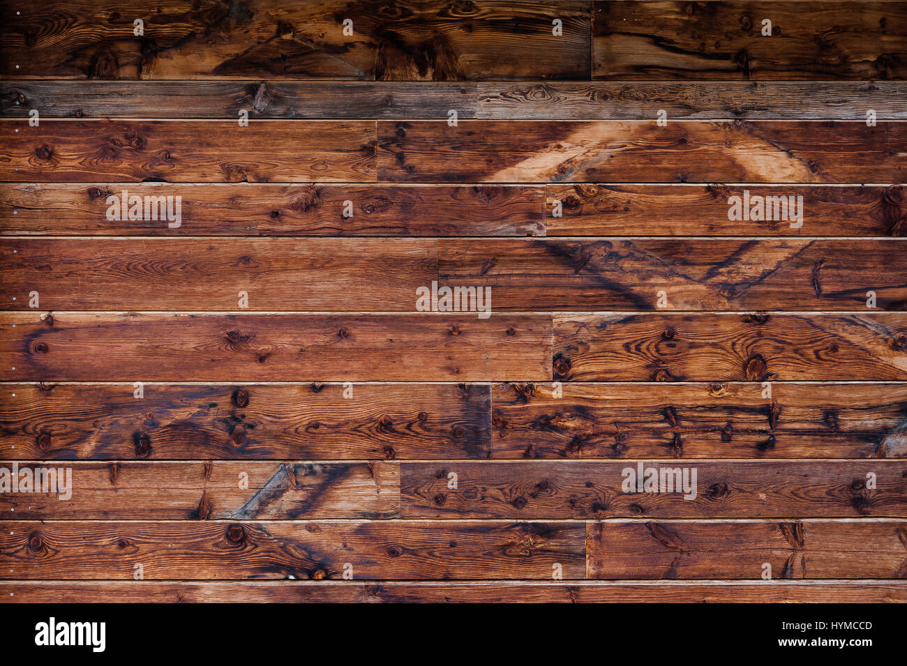 Close-up of horizontal planks forming wall of wood building with ...