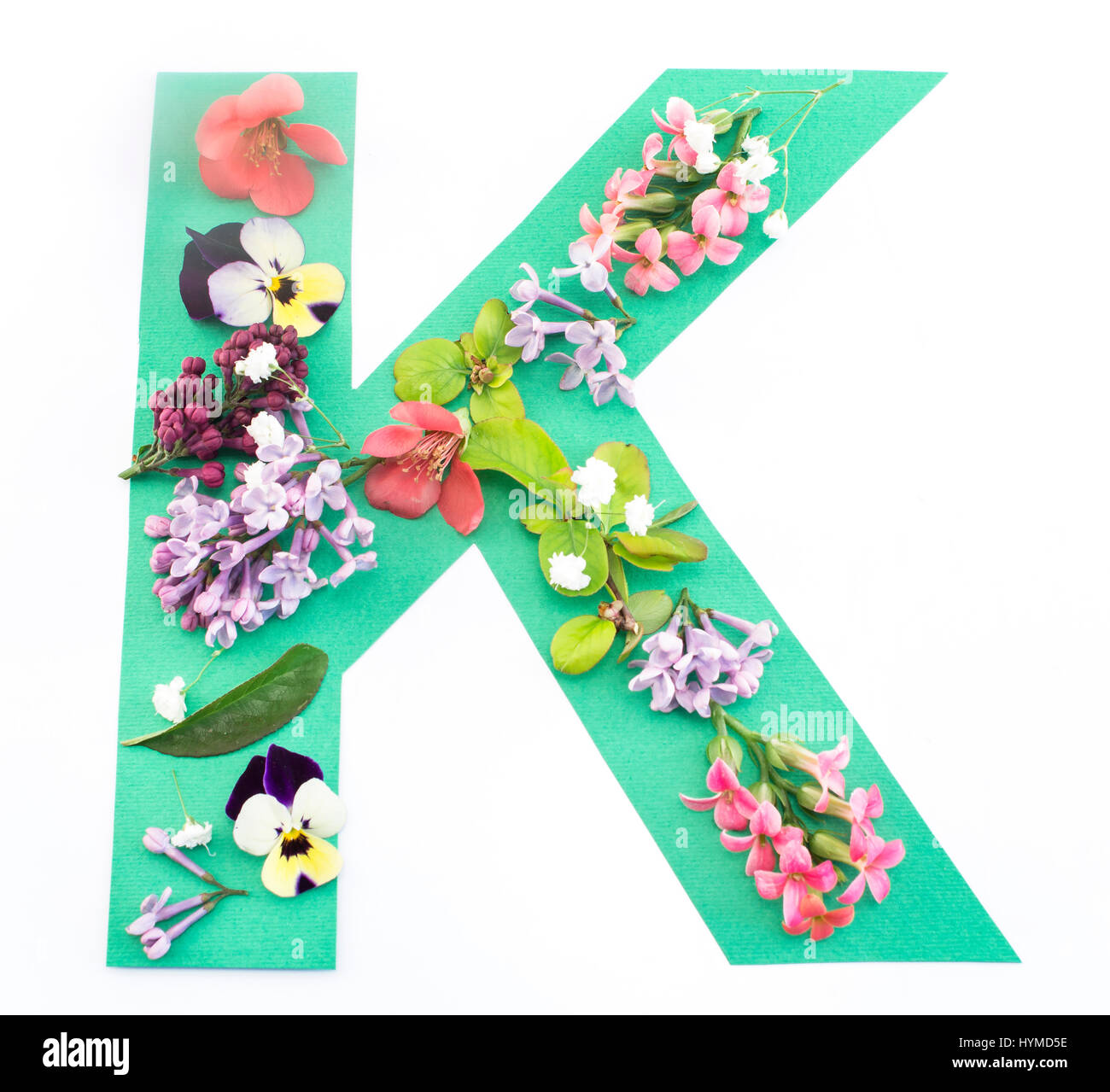 Letter K Made of Spring Flowers and Paper, on White Background Stock ...