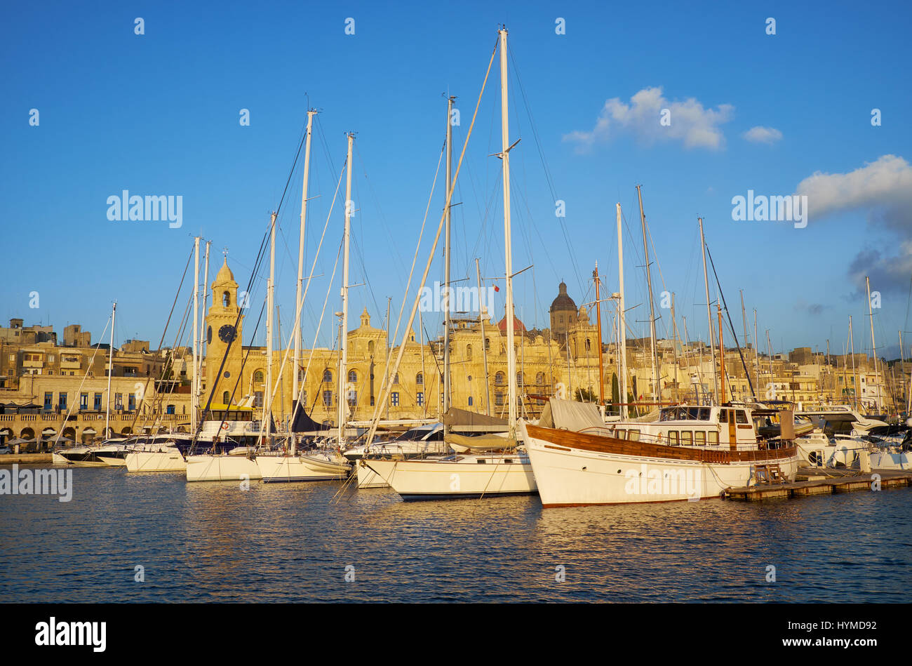 The yachts and boats moored in the harbor in Dockyard creek in front of ...