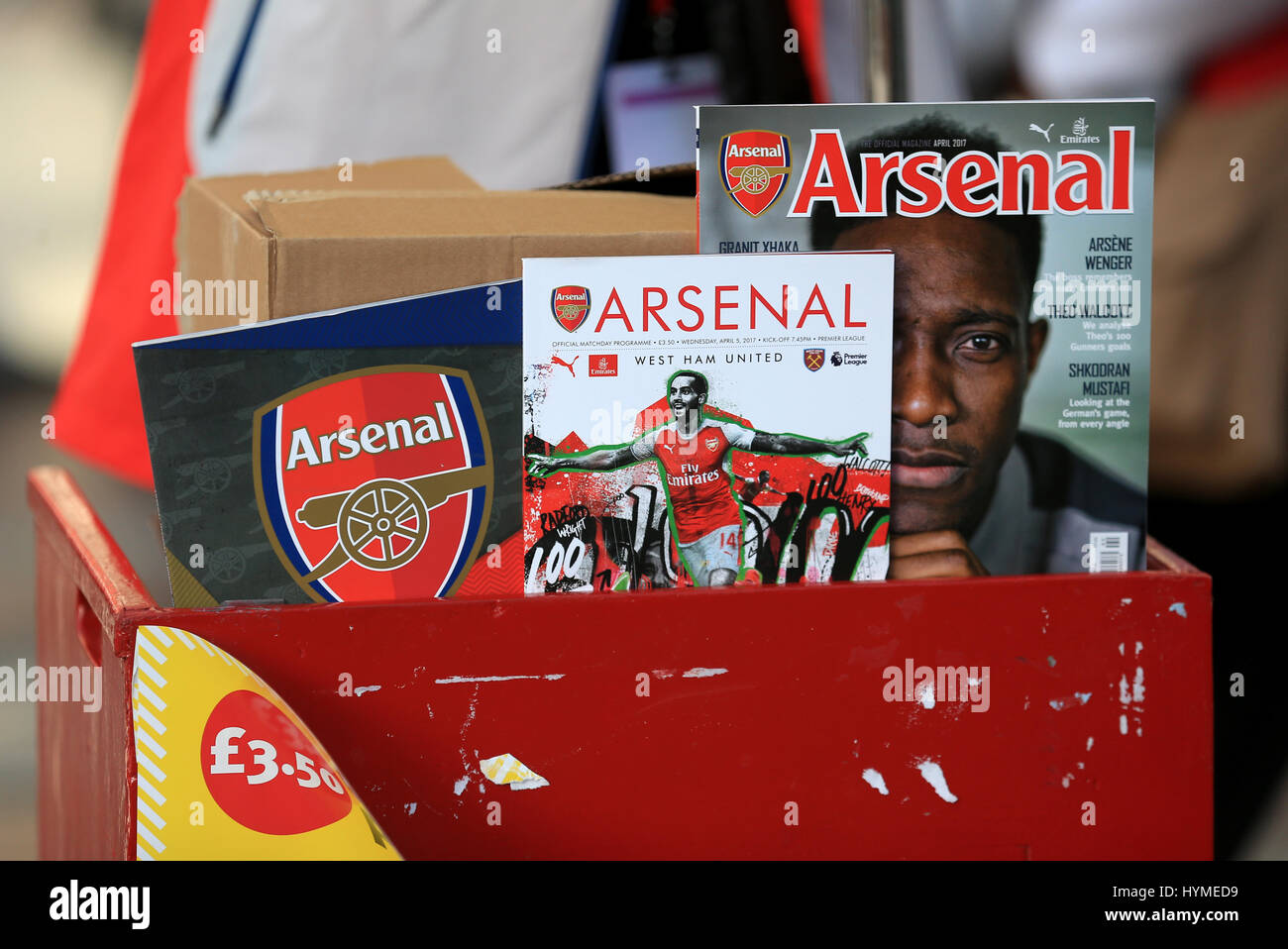 A vendor sells a match day programme during the Premier League match at ...