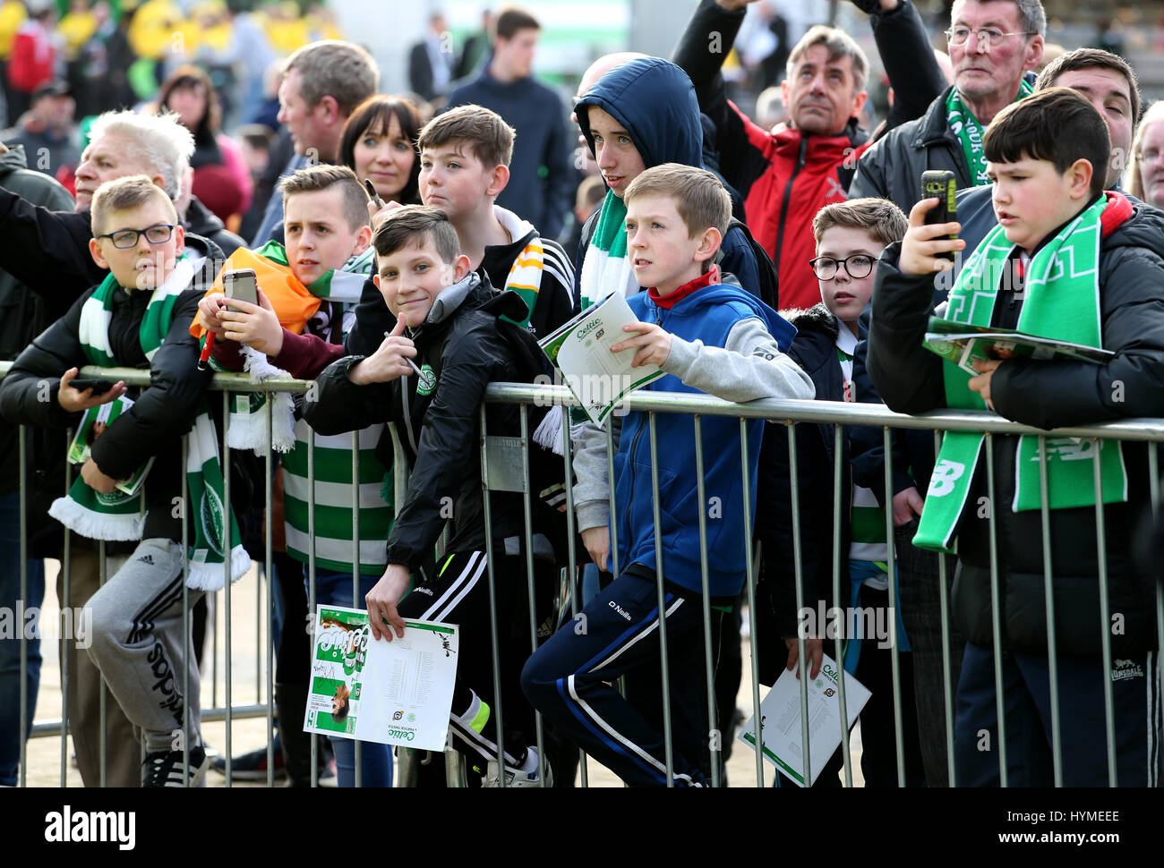 Young Celtic fans wait for the arrival of the team bus ahead of the ...