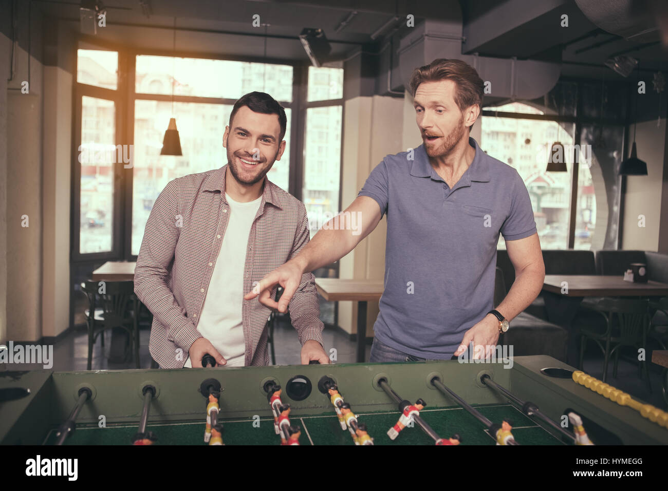 Friends having fun in pub Stock Photo - Alamy