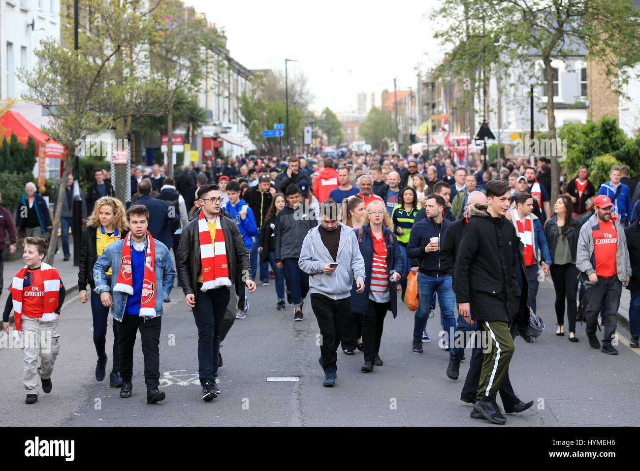 Arsenal fans walk up Gillespie Road during the Premier League match at ...