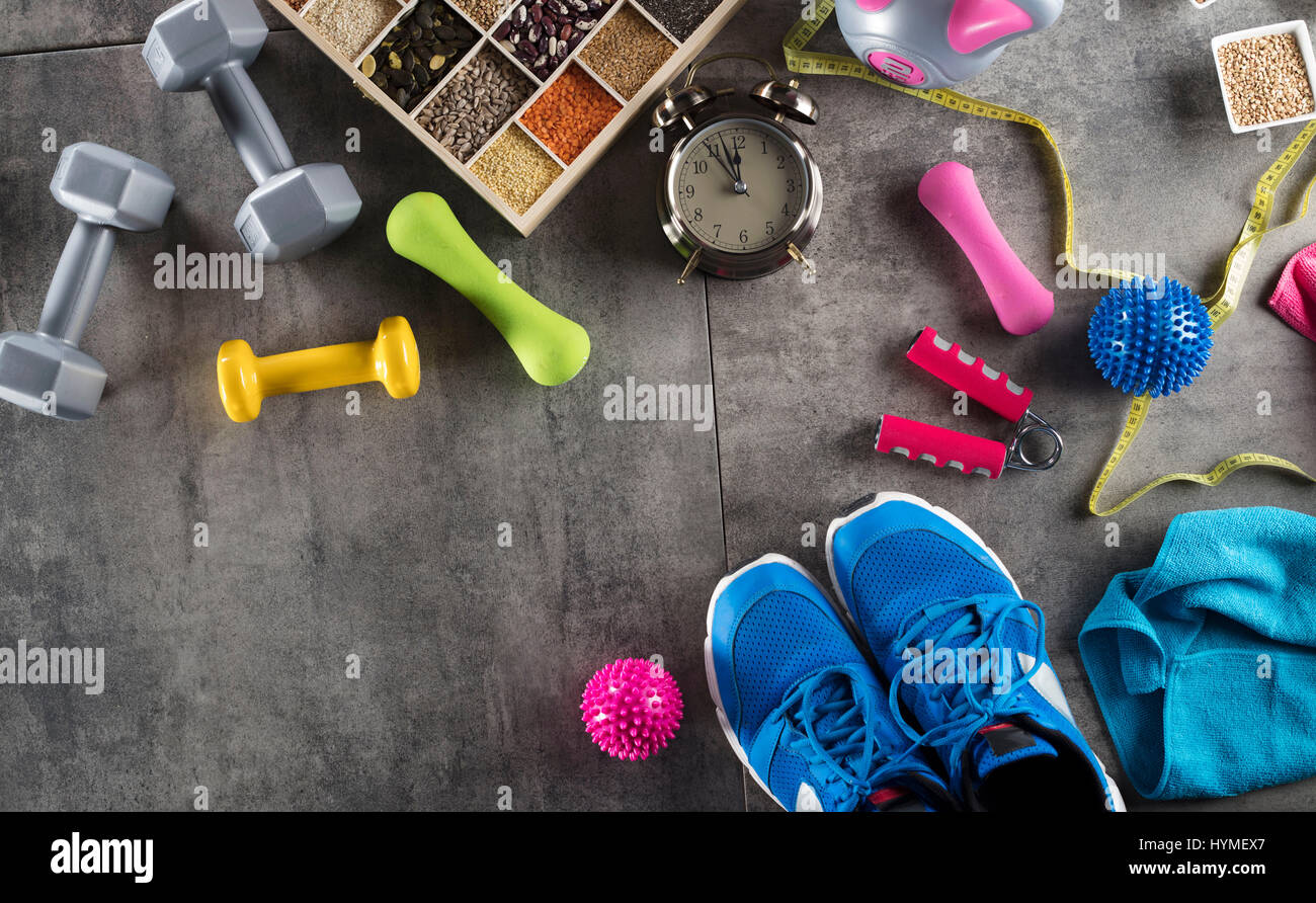 Fitness concept - objects and nutrition on stone floor Stock Photo - Alamy